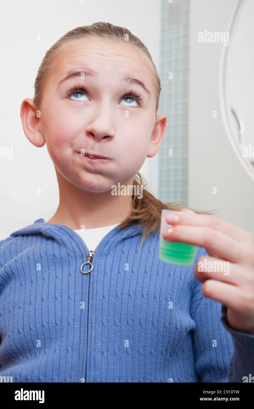 Rinsing teeth hi-res stock photography and images - Alamy