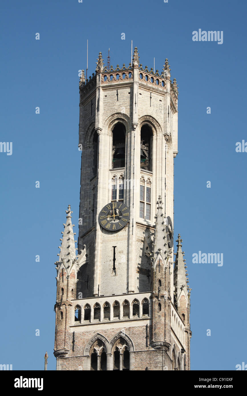 The Belfry tower and the historic medieval buildings along the canals ...
