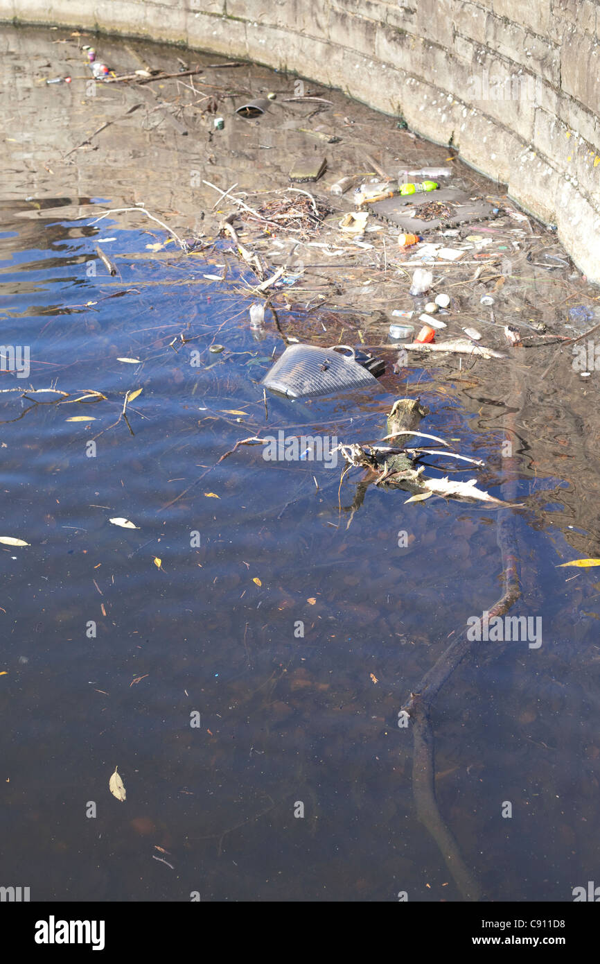 Litter polluting a local nature reserve lake Nottingham England UK ...