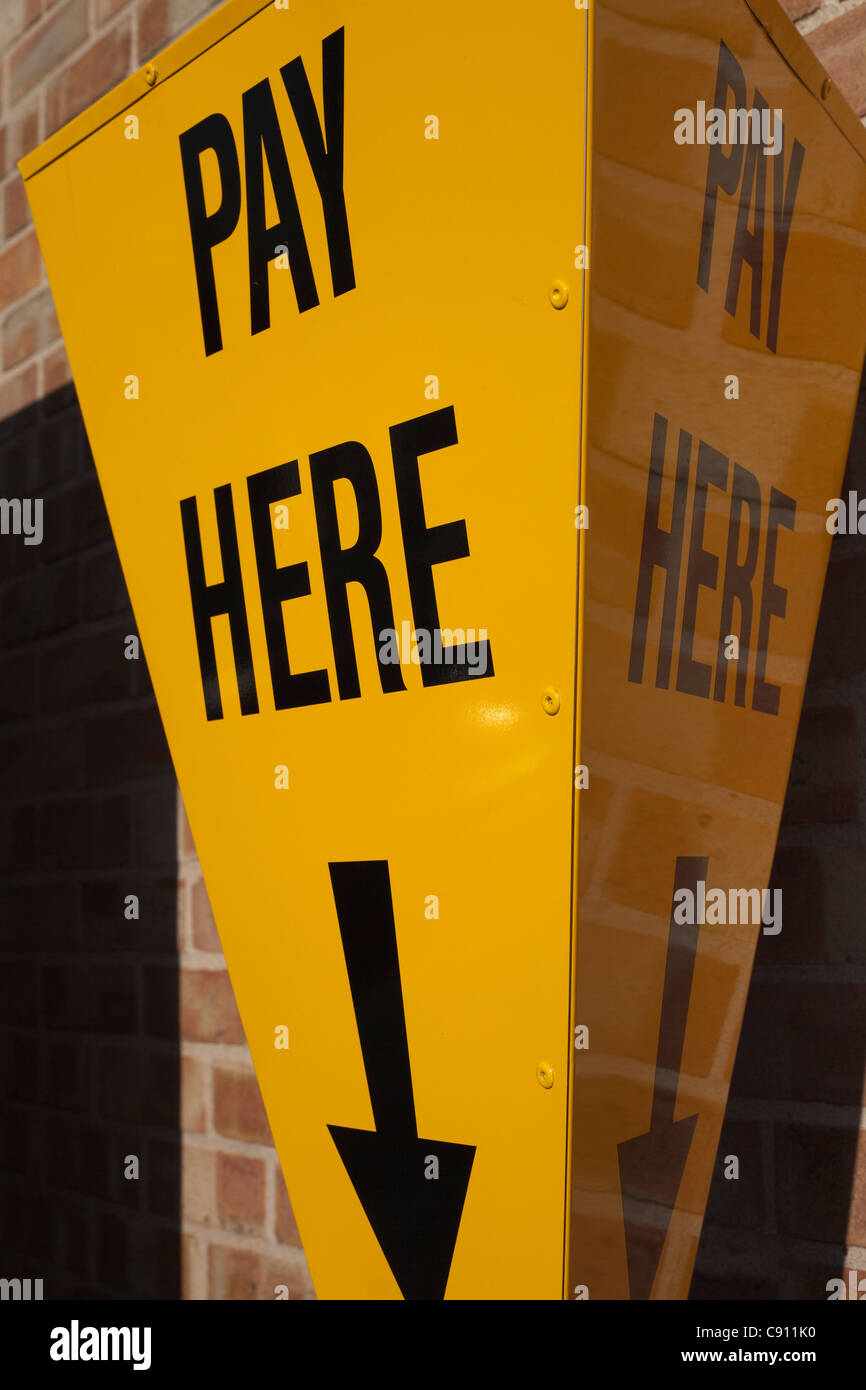 Pay Here sign Pay and display charges England UK Stock Photo - Alamy