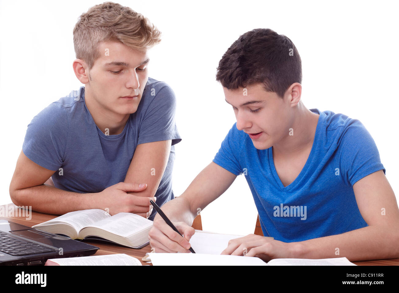 Two young guys studying Bible passages Stock Photo - Alamy