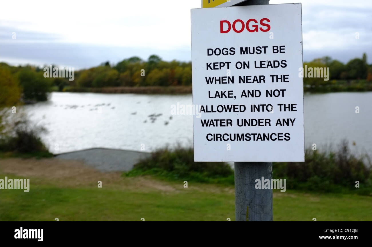 A warning sign at Northlands Park Lake in Basildon Stock Photo - Alamy
