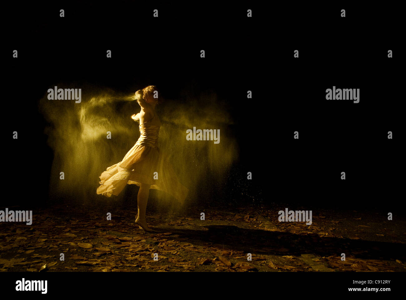 girl dancing in the darkness Stock Photo - Alamy