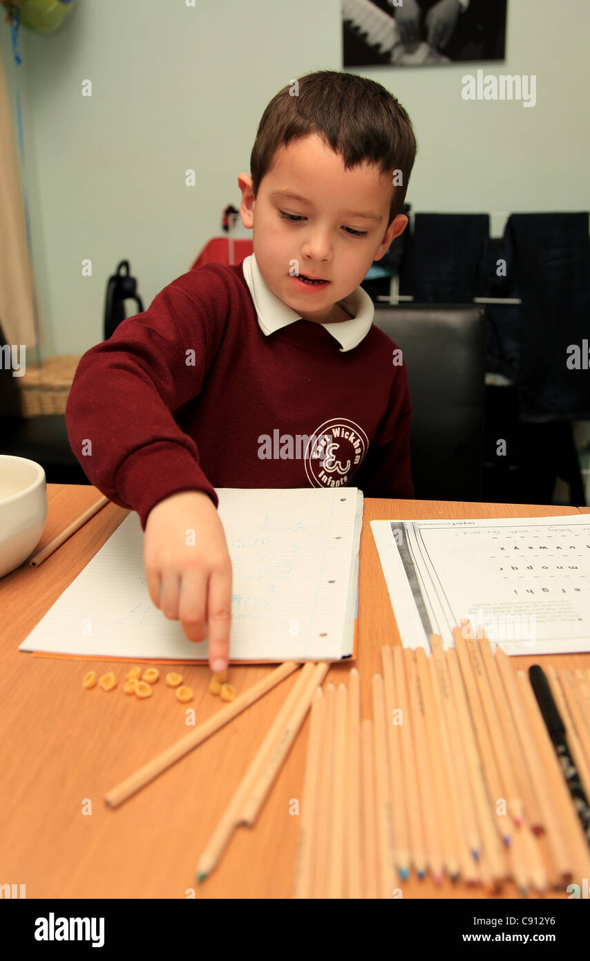 British school child writing hi-res stock photography and images - Alamy