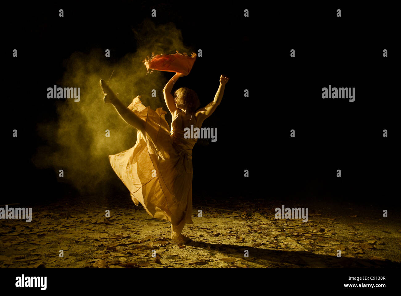 girl dancing in the darkness Stock Photo - Alamy