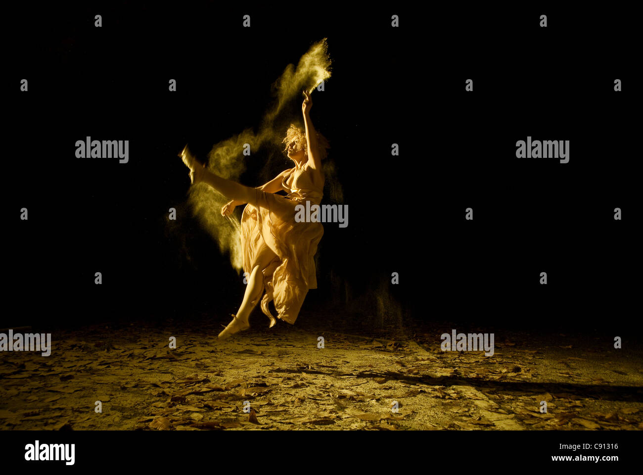 girl dancing in the darkness Stock Photo - Alamy