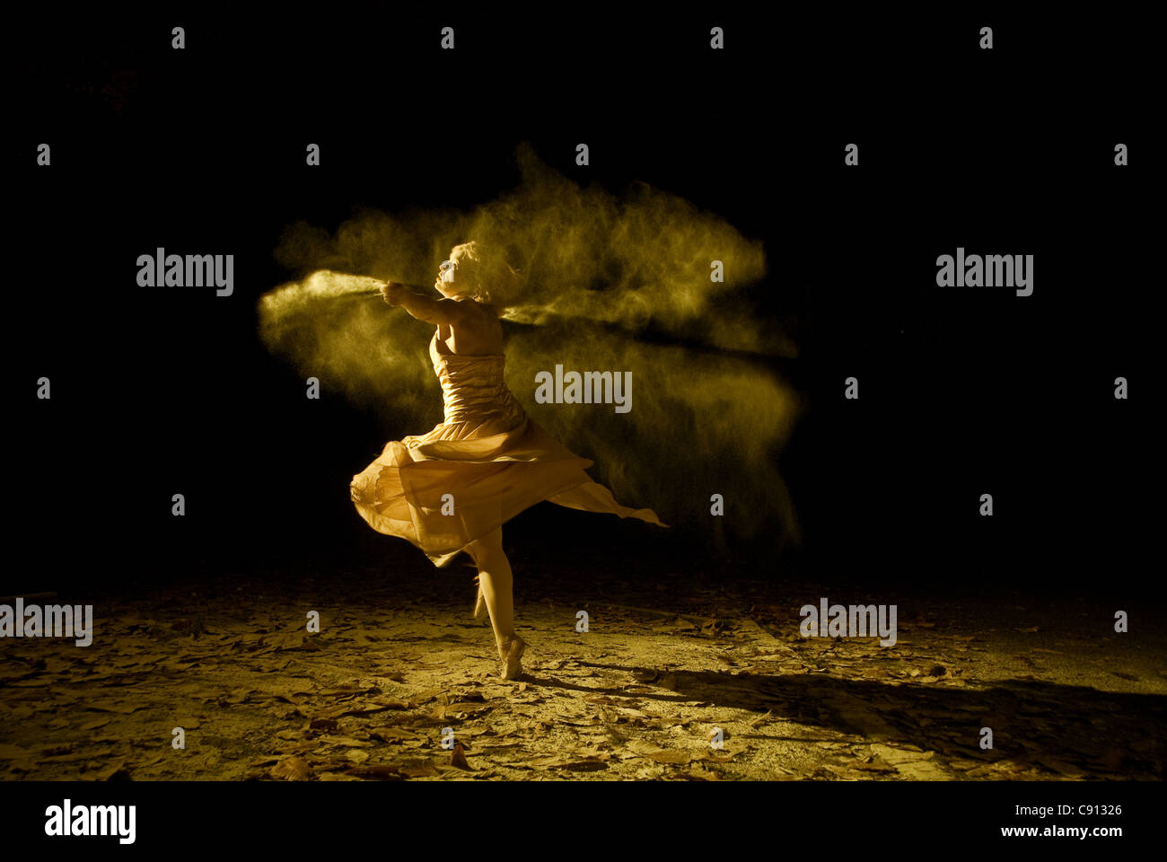 girl dancing in the darkness Stock Photo - Alamy
