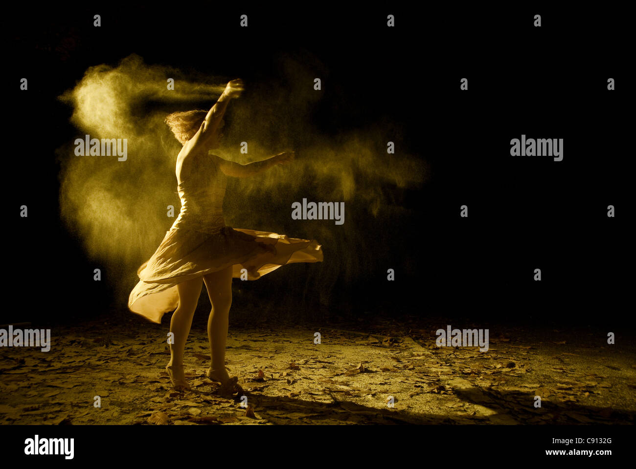 girl dancing in the darkness Stock Photo - Alamy