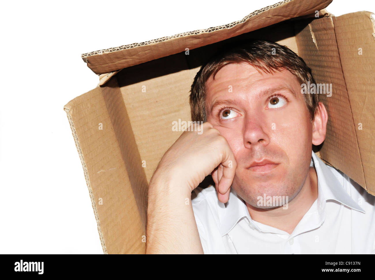 Businessman thinking inside the box Stock Photo - Alamy