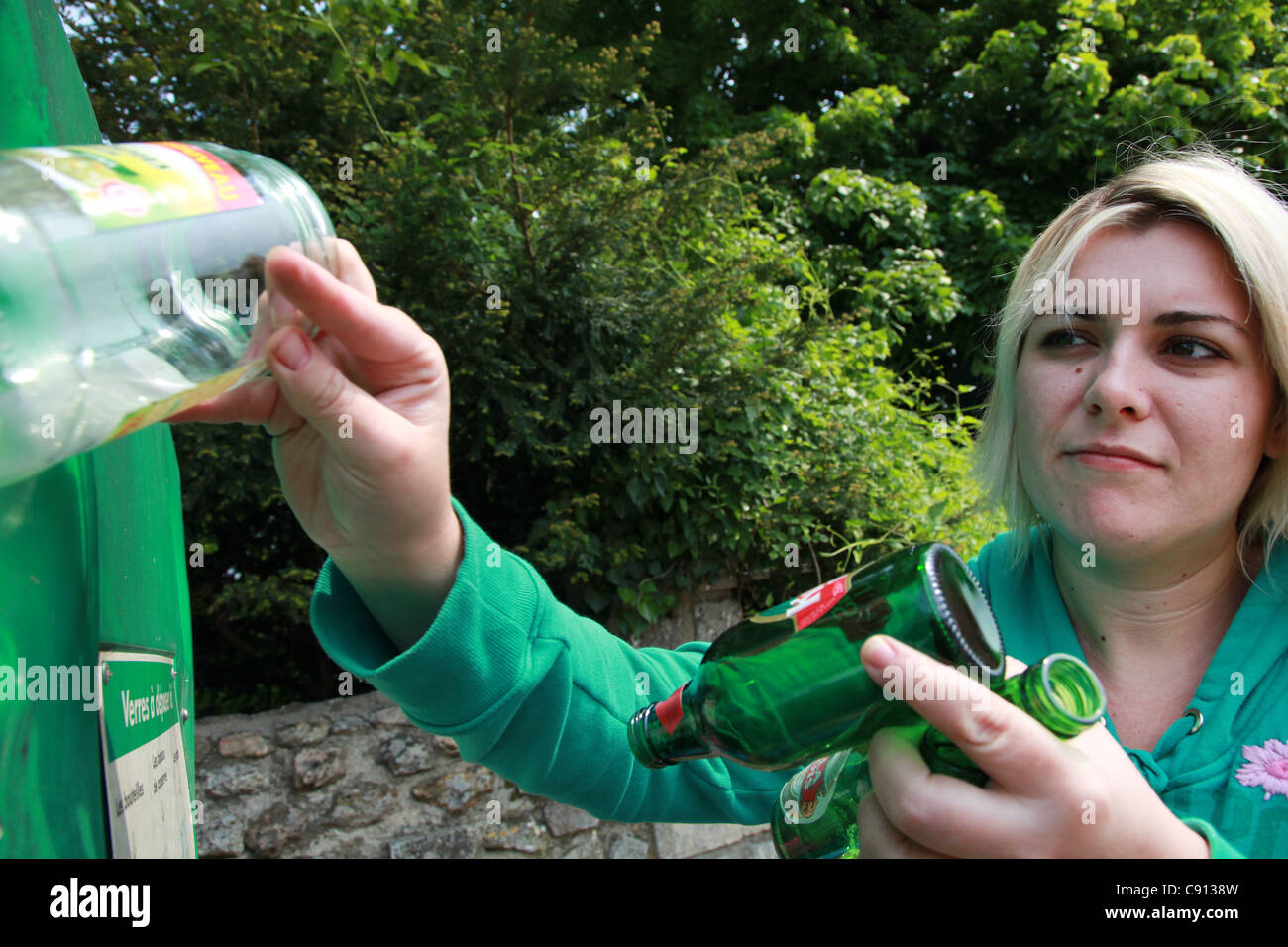 Clear glass bottle recycling bins hi-res stock photography and images - Alamy