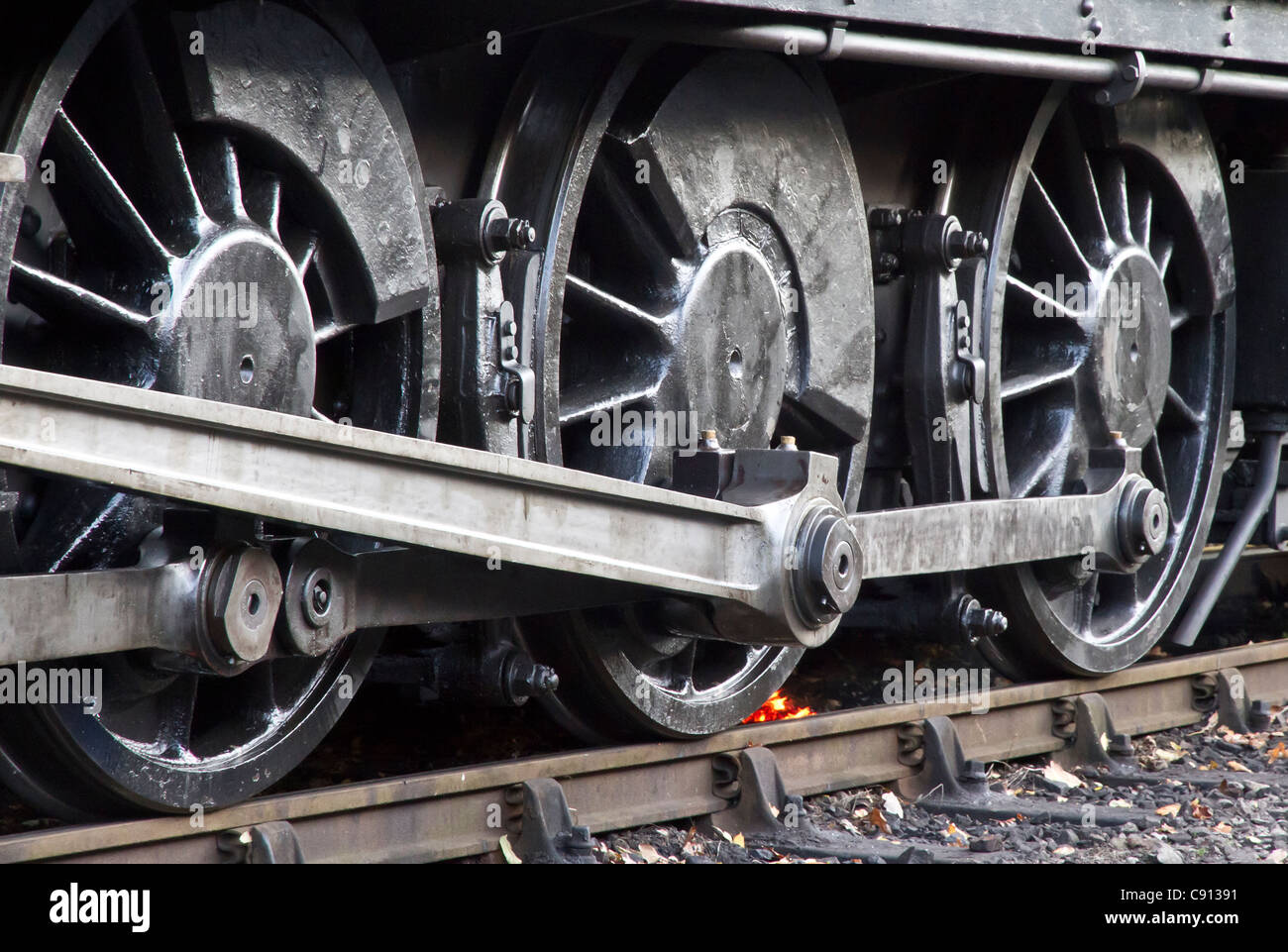 Glowing coal under steam locomotive Stock Photo - Alamy