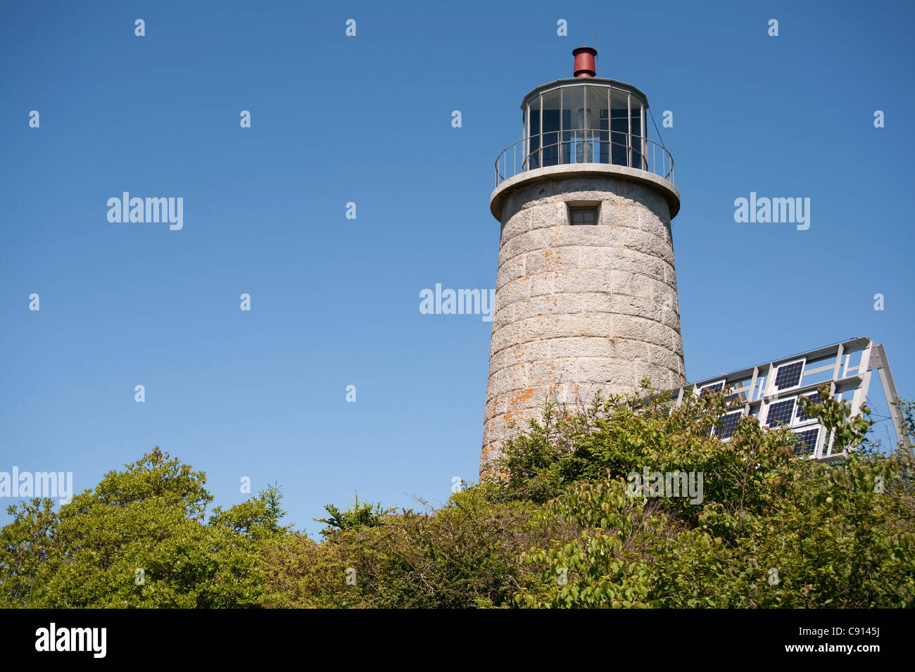The lighthouse at Monhegan Island, ME with solar panels Stock Photo - Alamy