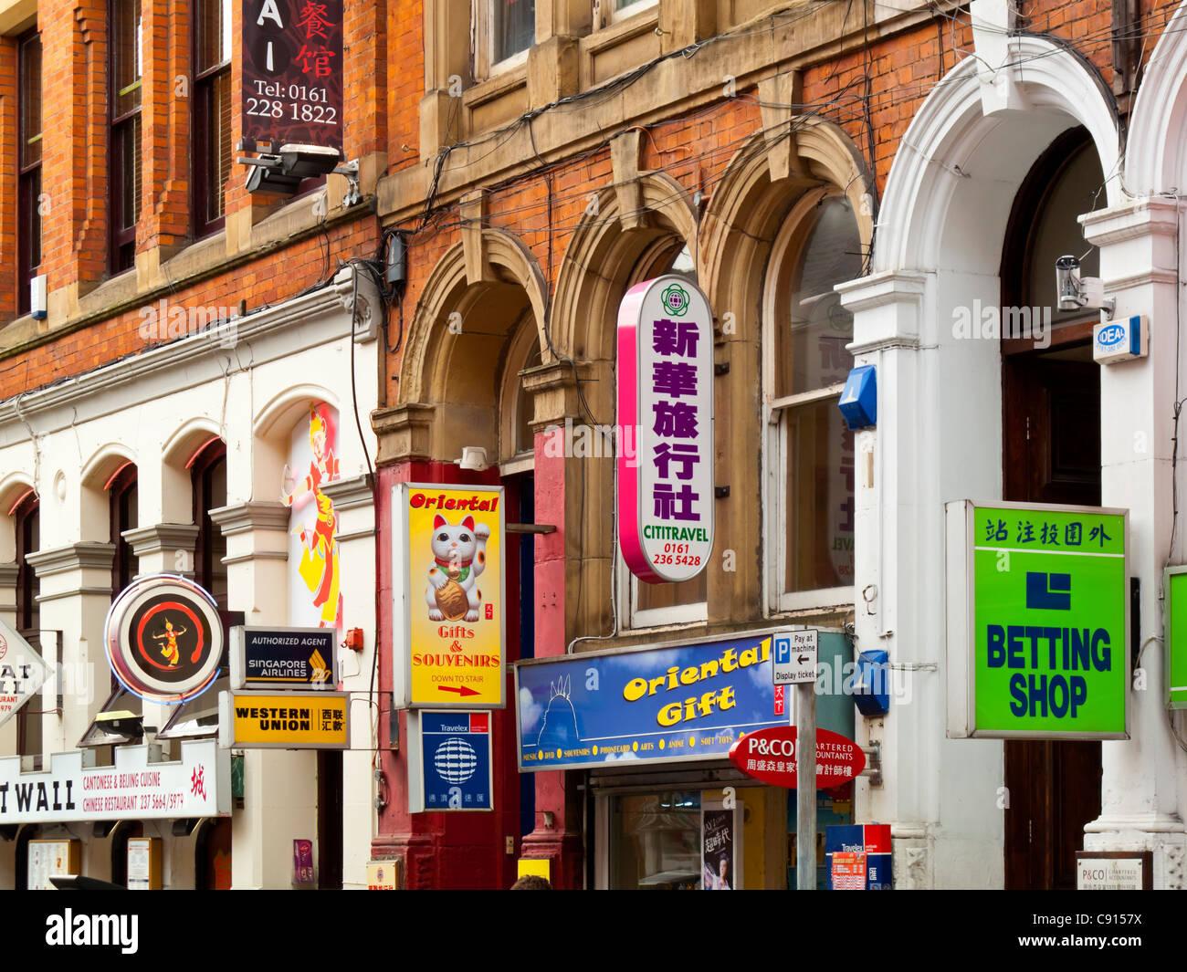 Colourful signs on buildings in the Chinatown area of Manchester city ...