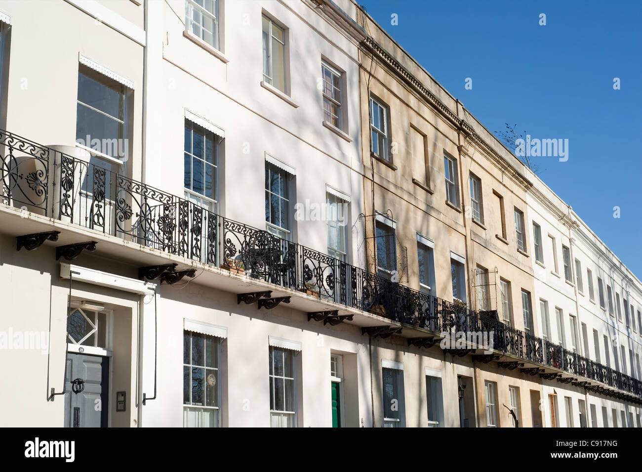 The town of Cheltenham has Regency terraces of cream-white houses and ...