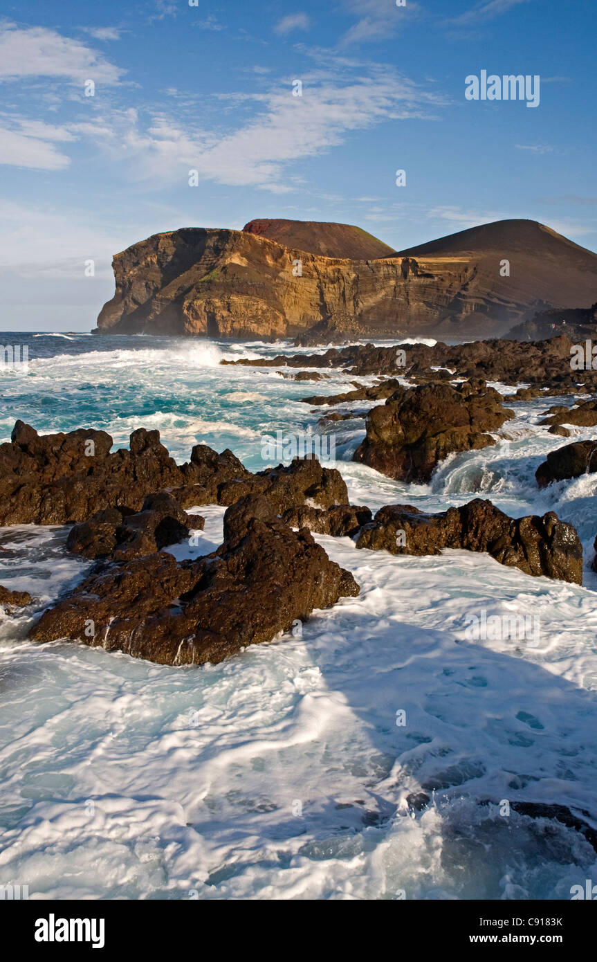 The coast of Faial is dotted with the igneous rock, cooled lava which ...