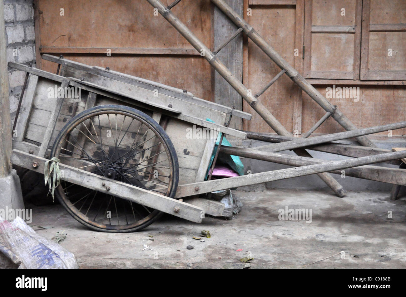 Traditional wooden carts are used widely in Vietnam. Simple two wheeled ...
