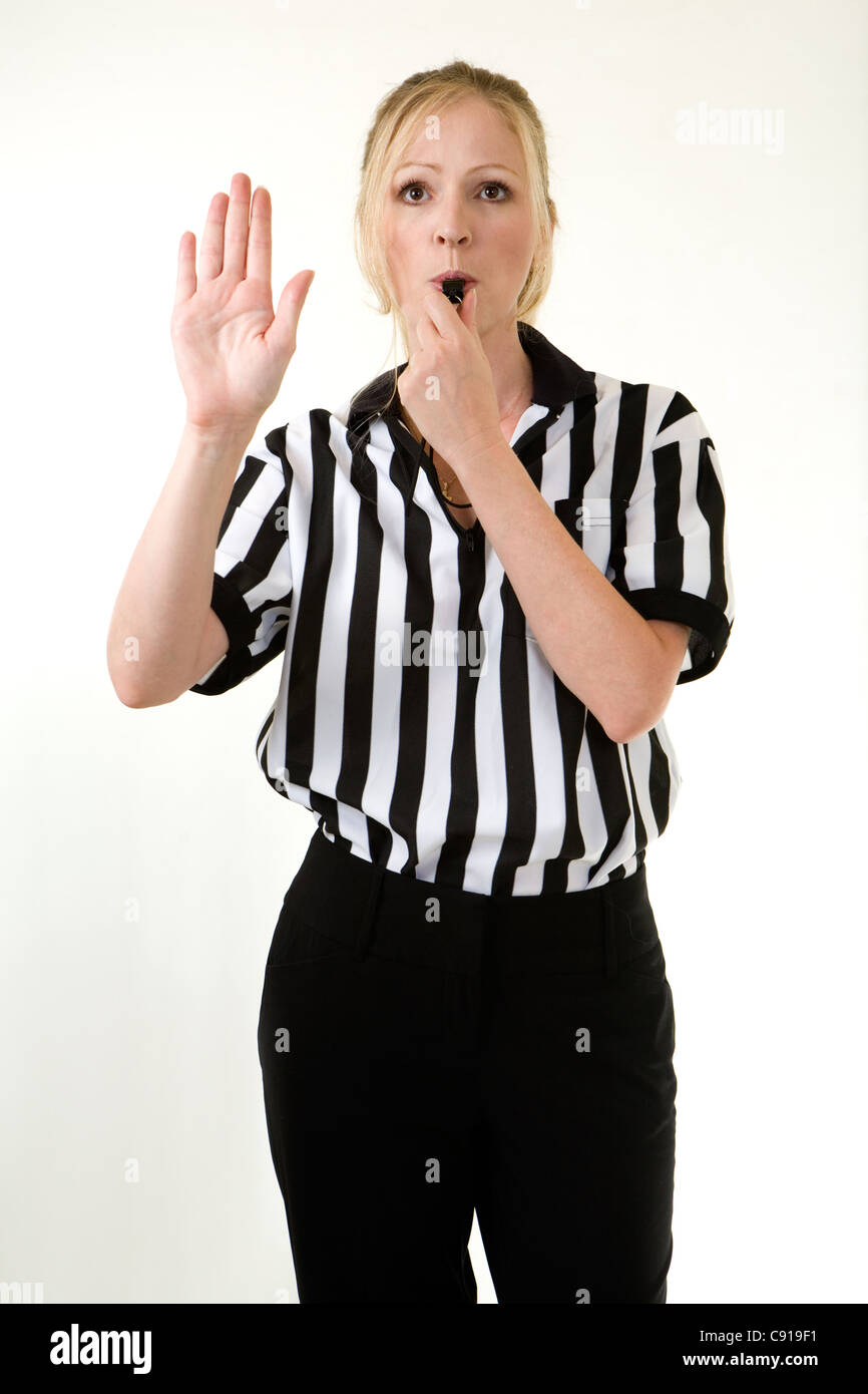 Attractive blond woman wearing black and white striped referee uniform ...