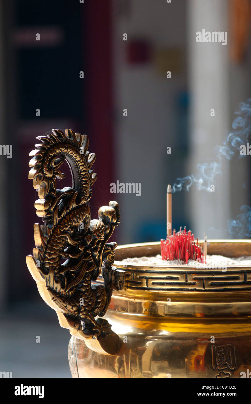 Burning incense sticks in a Chinese Temple, Petaling Street, Kuala ...