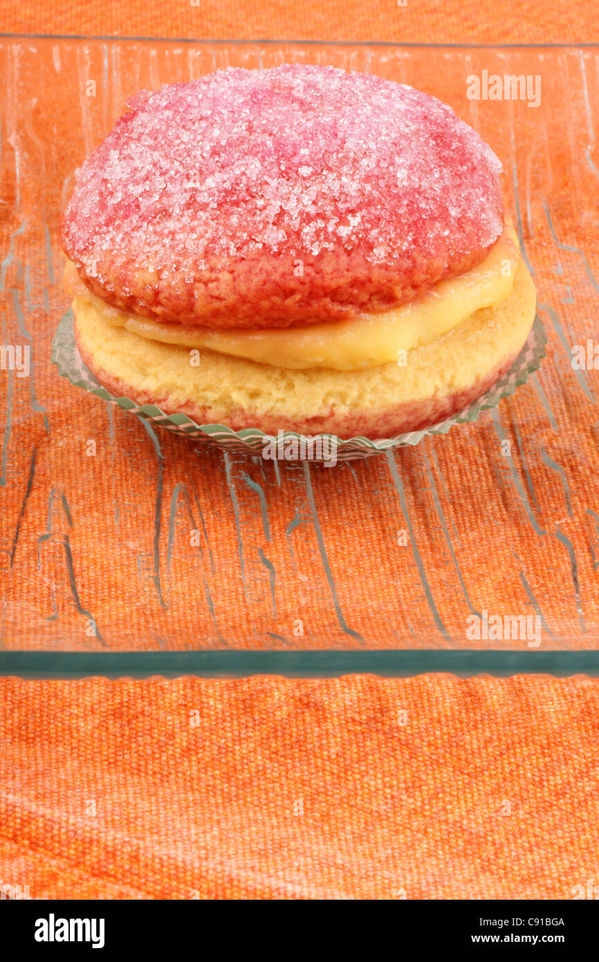 Italian custard pastry with alchermes and sugar Stock Photo - Alamy