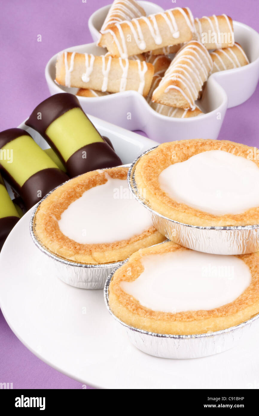 Assortment of Swedish and Danish sweets composed of glazed almond tarts ...