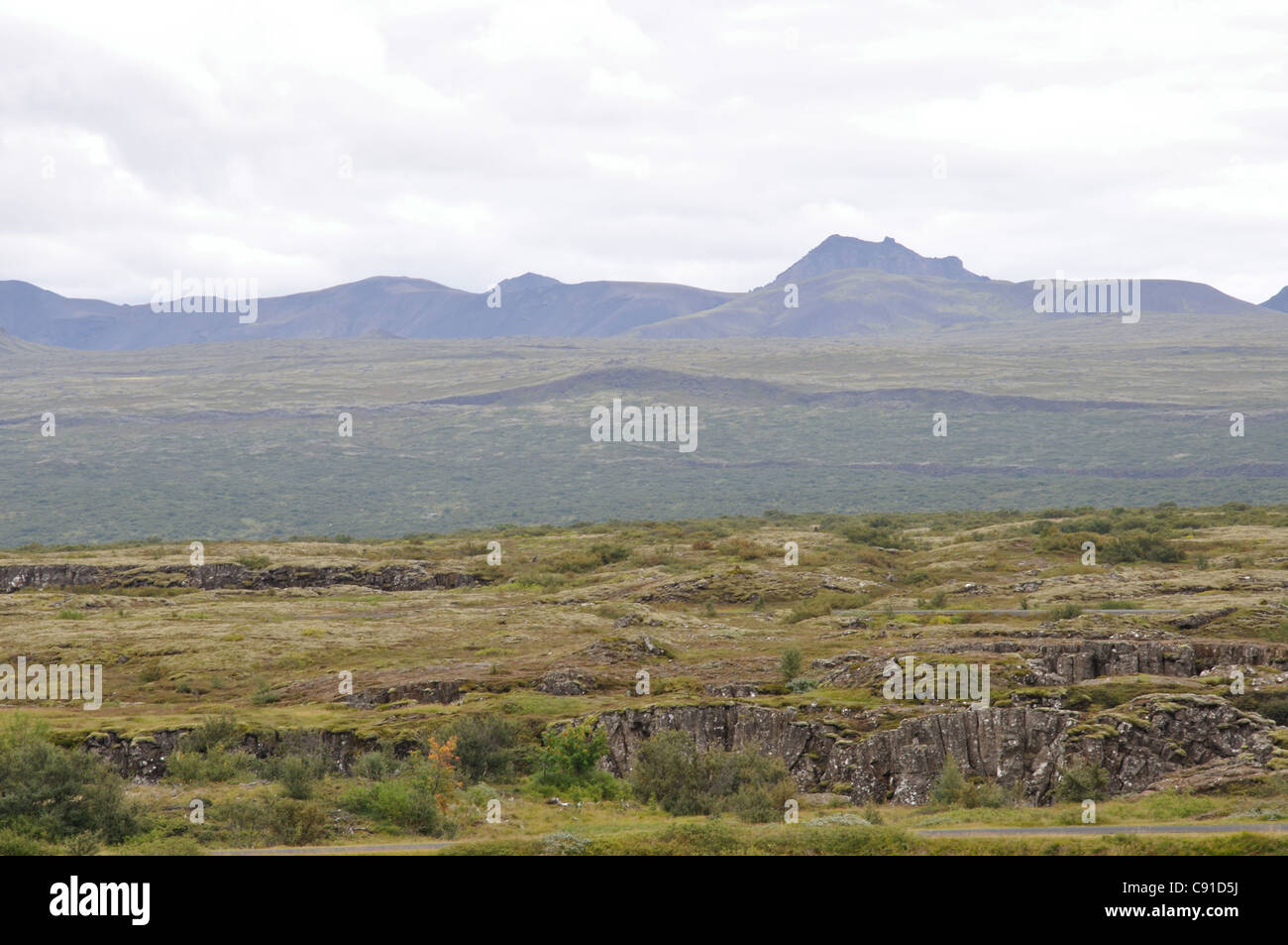 Pingvellir is the site of a rift valley that marks the crest of the Mid ...