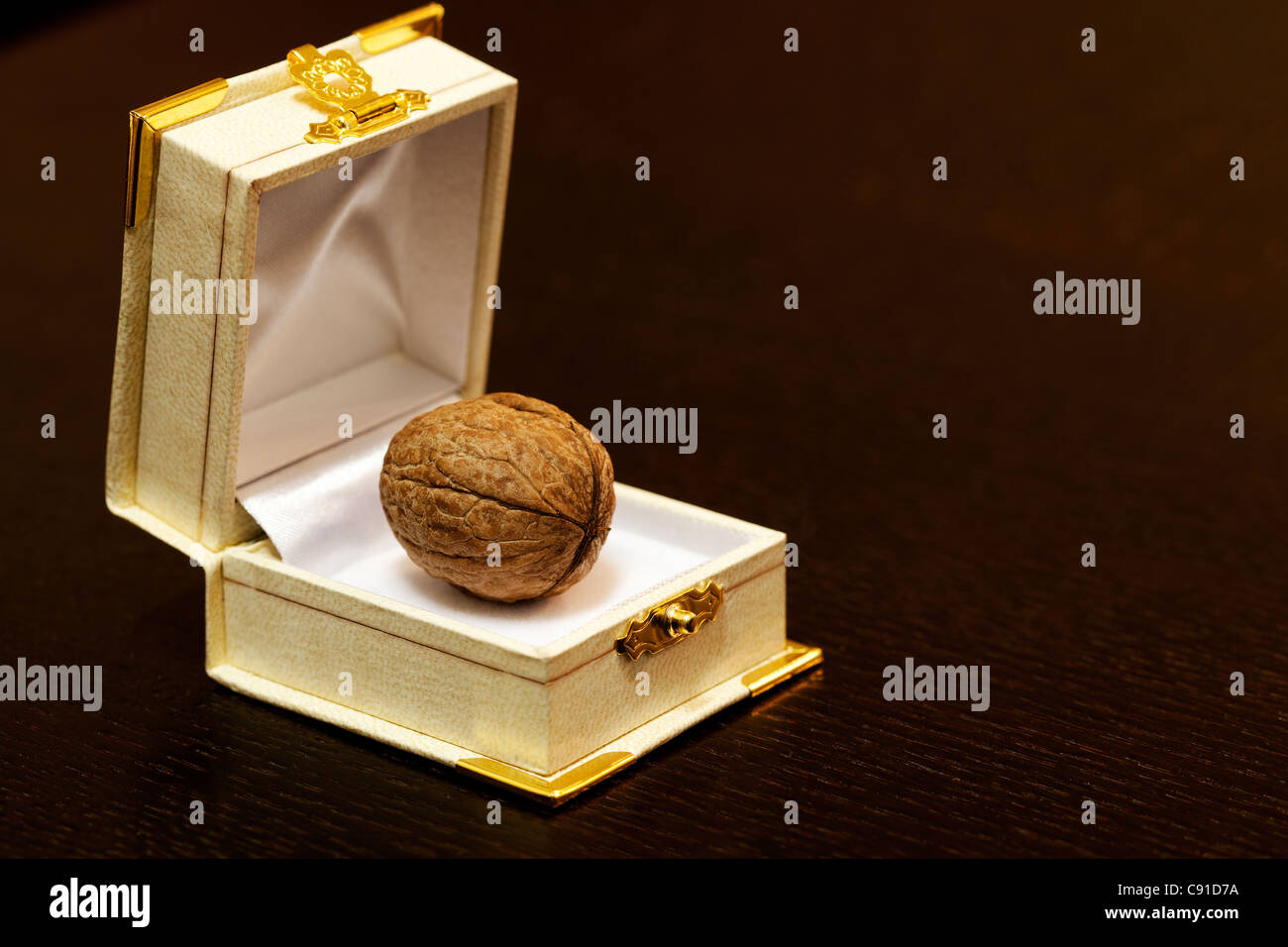 Walnut in a box Stock Photo - Alamy