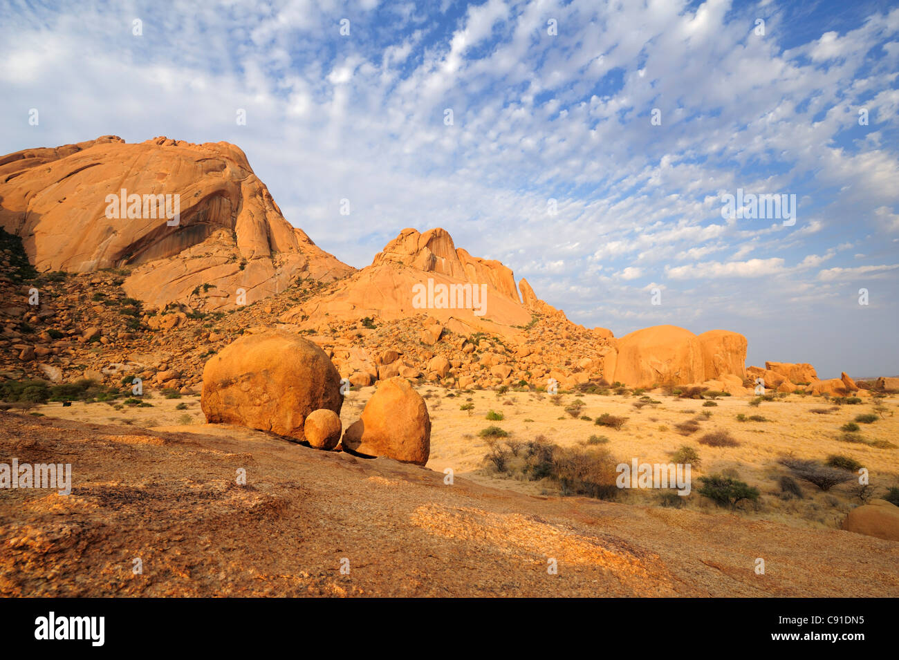 Red balancing granite rock in front of Great Spitzkoppe, Great ...