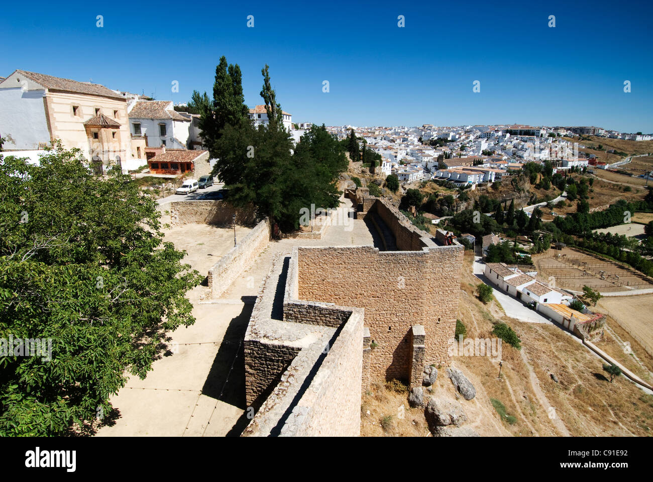 Ronda's city walls diominate the historic quarter Stock Photo - Alamy