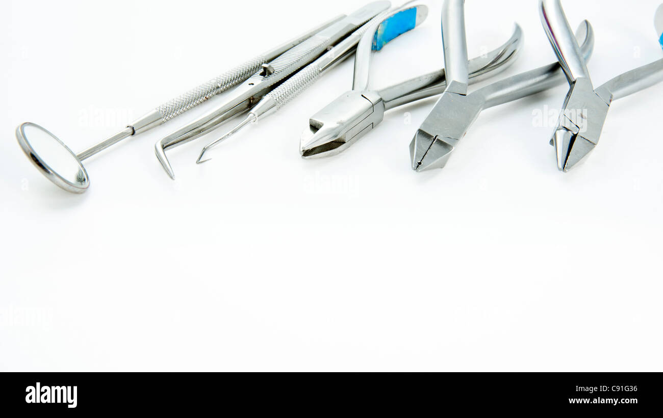 Set of metal medical equipment tools for teeth dental care Stock Photo ...