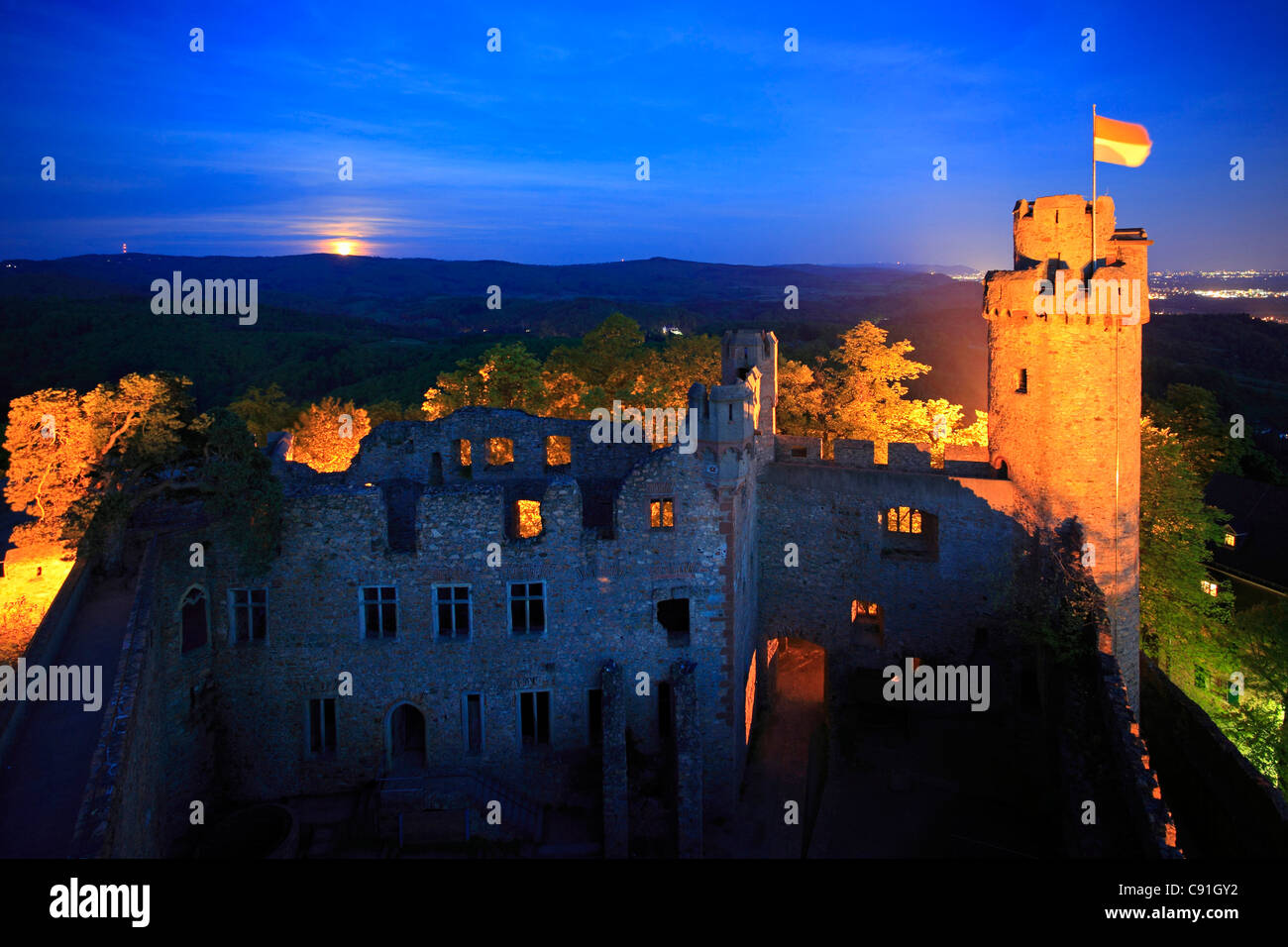 Moonrise over the illuminated Auerbach castle, near Bensheim, Hessische ...