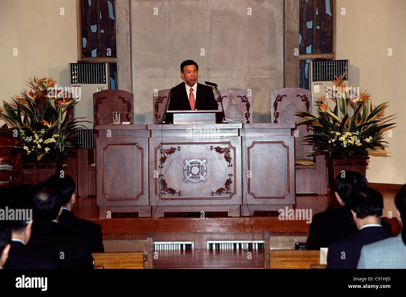 Preaching during weekday ceremony, Unification Church of Moon, Seoul ...
