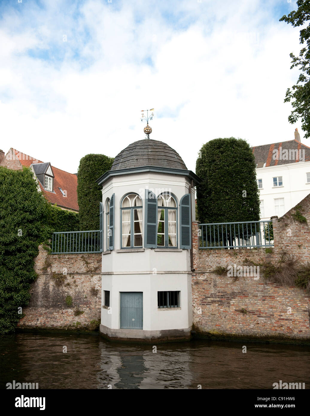 Many of Bruges historic merchant homes front onto an intricate network ...