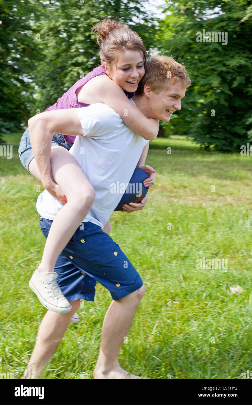 Girl getting piggyback ride hi-res stock photography and images - Alamy