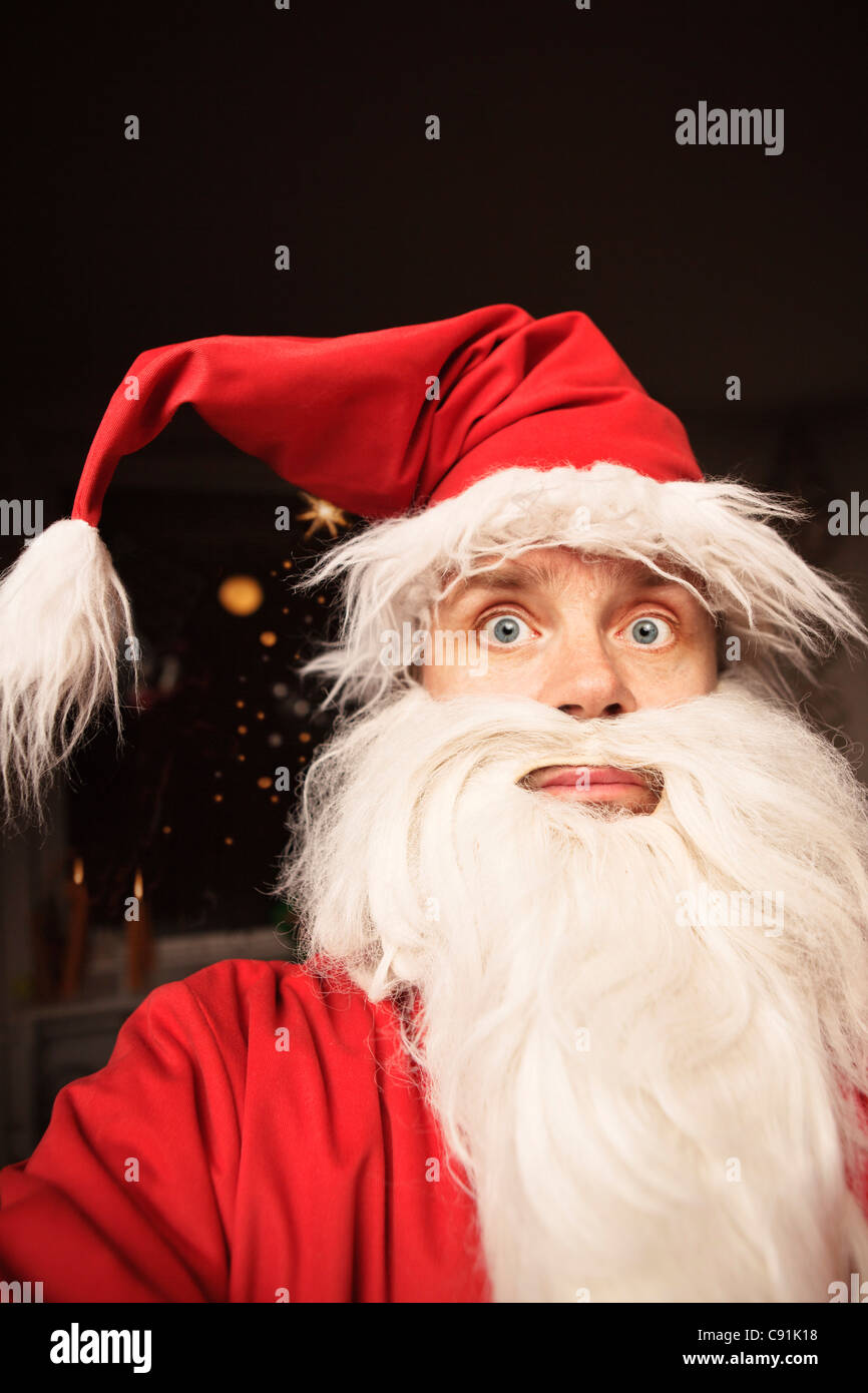Man wearing Santa Claus suit Stock Photo - Alamy