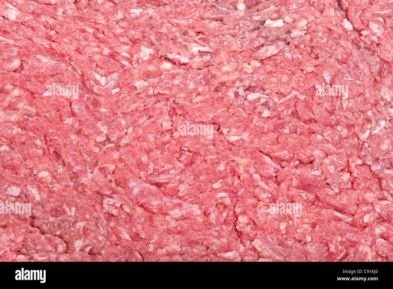 The surface of raw ground beef showing the fatty tissue Stock Photo - Alamy