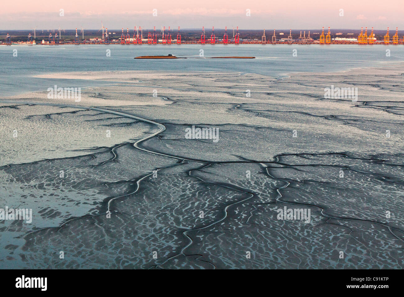 Aerial view of tidal inlets in mudflats, Wadden Sea, Lower Saxony ...