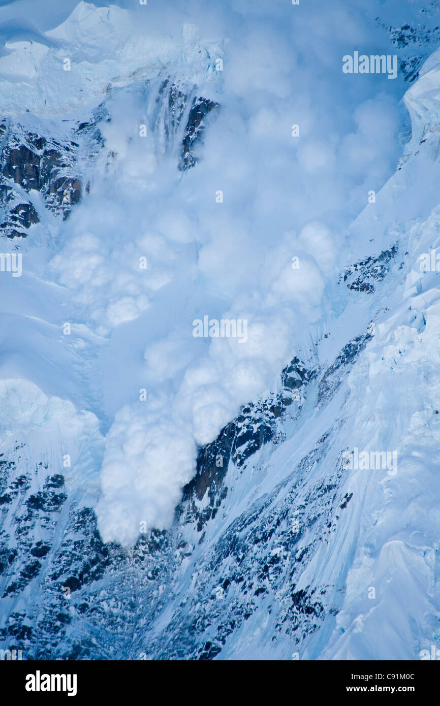 Billowing ice avalanche on the north side of Mount Hunter seen from ...