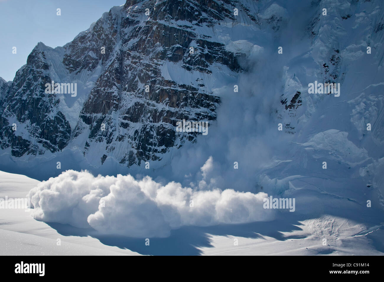 Billowing ice avalanche on the north side of Mount Hunter seen from ...