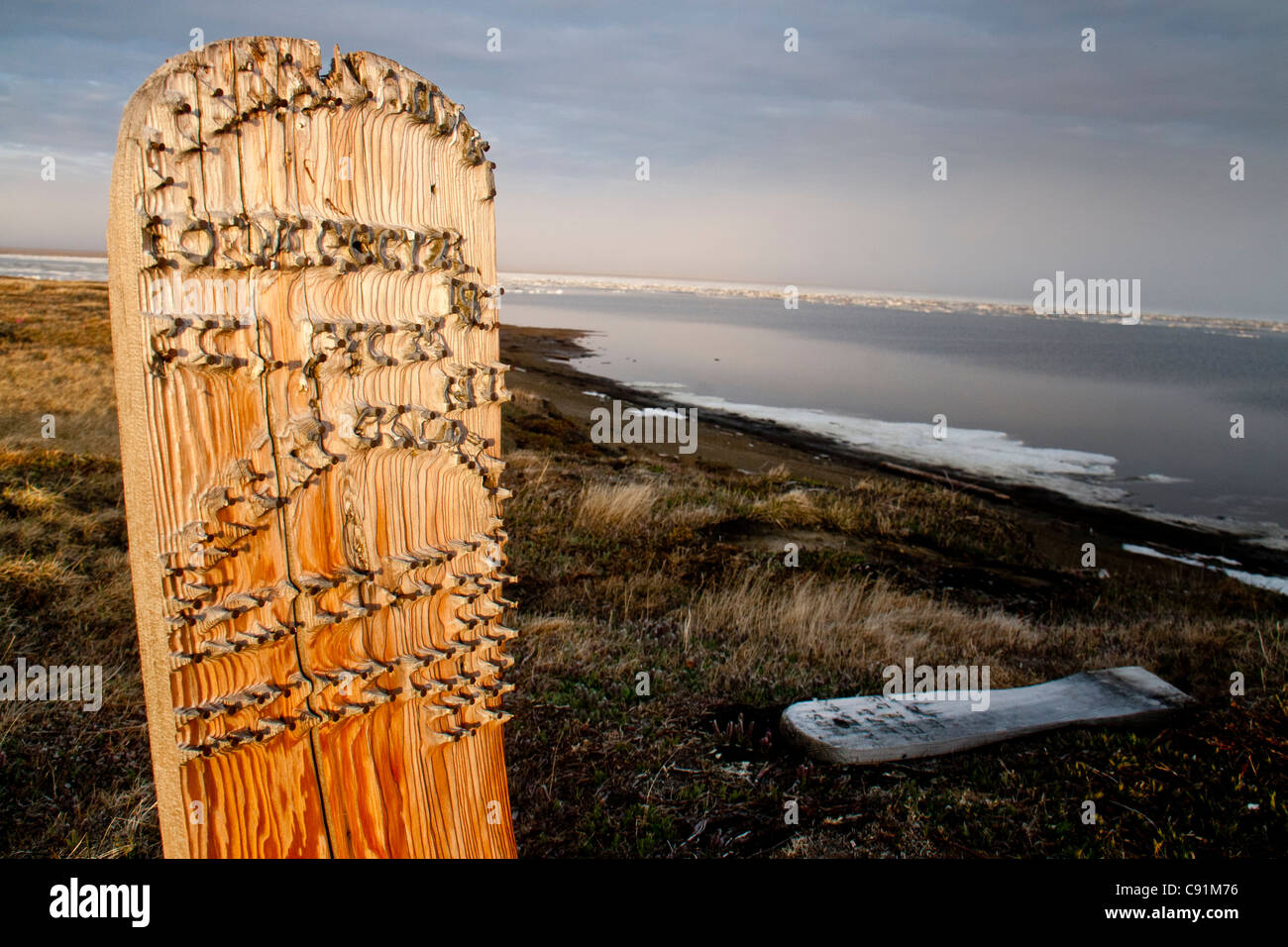 Wood tombstone and coffins on Barter Island near Kaktovik, North Slope ...
