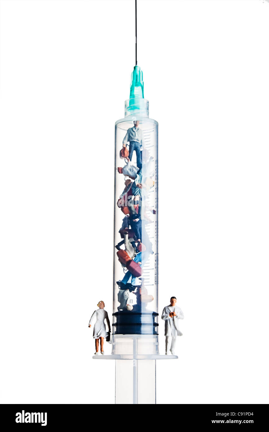 Medical figurines placed outside syringe, patient figurines placed ...