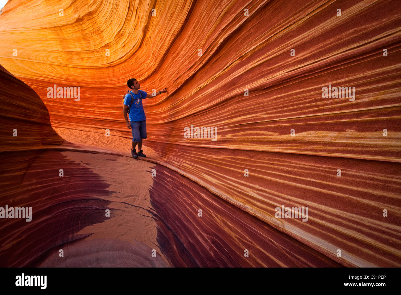 Hiker in slot canyon, The Wave, Coyote Buttes, Vermilion Cliffs ...