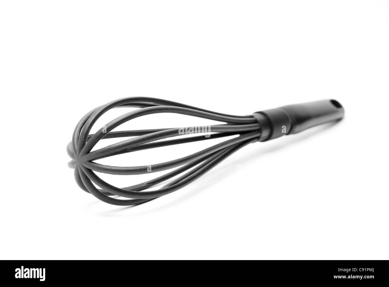 Black plastick kitchen whisk isolated on white background Stock Photo ...