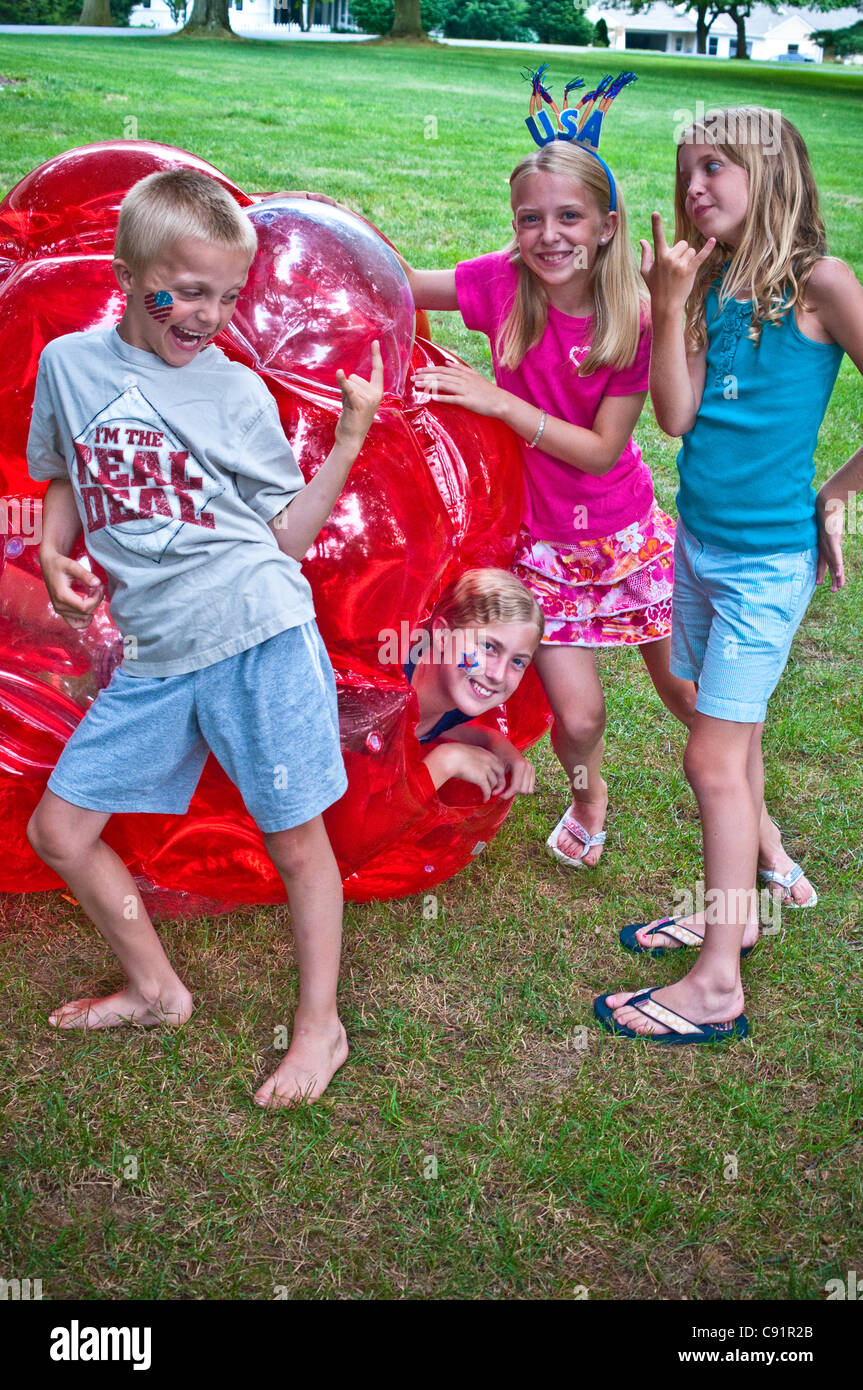 Family Activity Playing With Large Geodesic Style Inflatable Ball family-activity-playing-with-large-geodesic-style-inflatable-ball