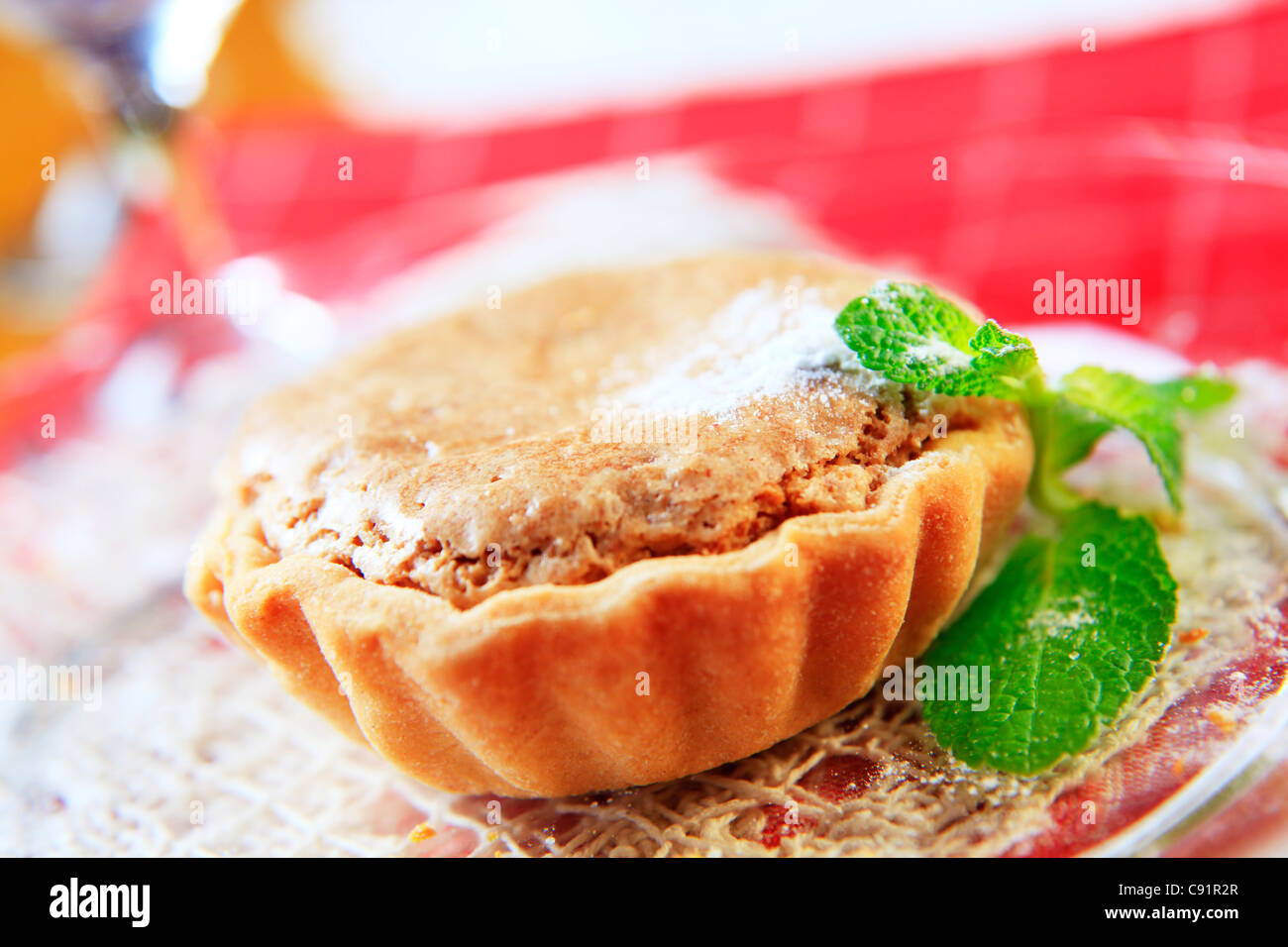 Small shortbread tart shell with nut filling Stock Photo - Alamy