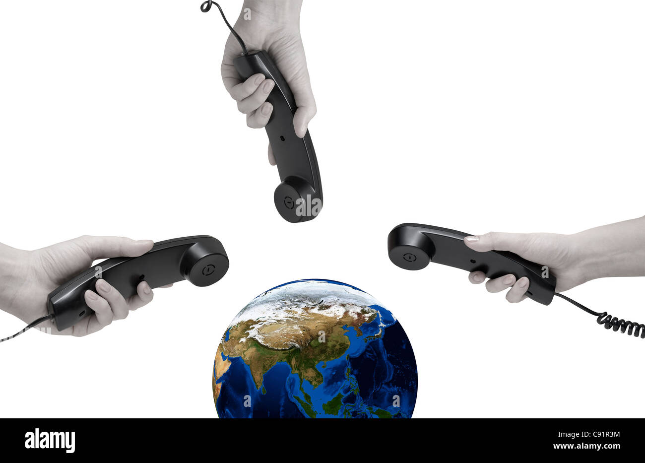World Communication on white. office black telephones with hands ...