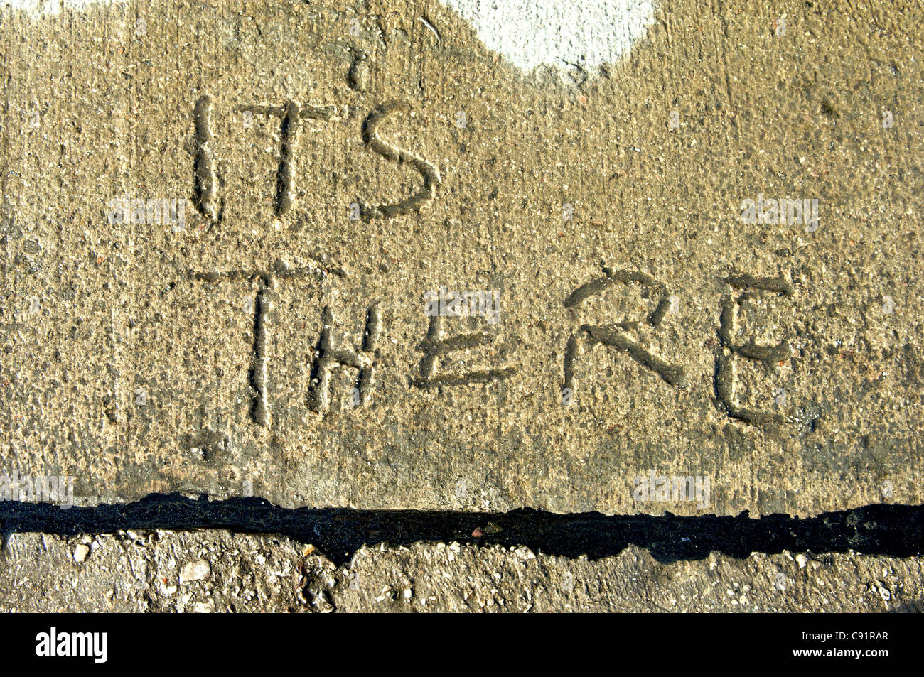 It's there written in concrete Stock Photo - Alamy
