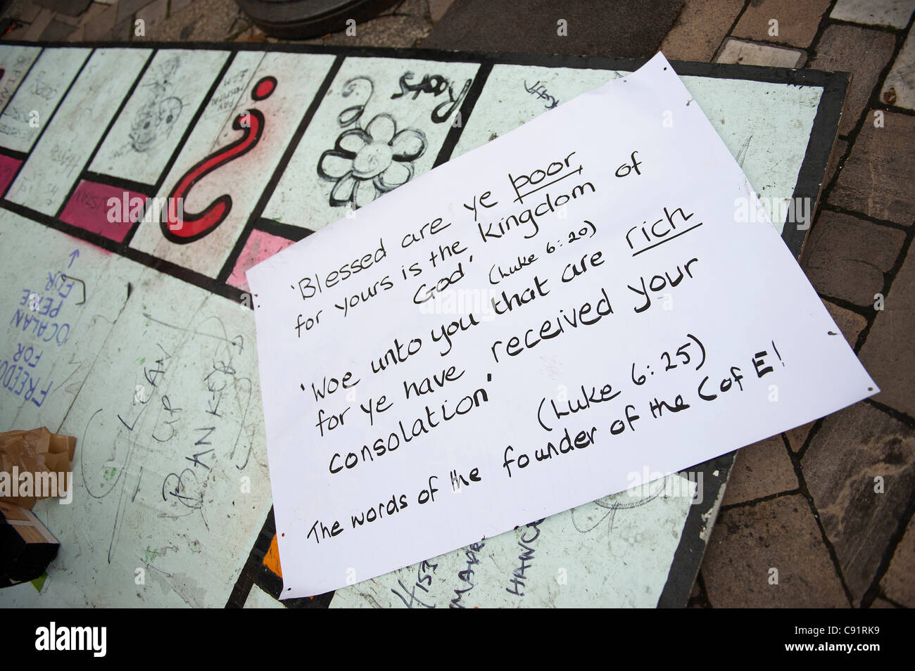 A quote from the Bible is seen on a large spoof Monopoly Game board at ...