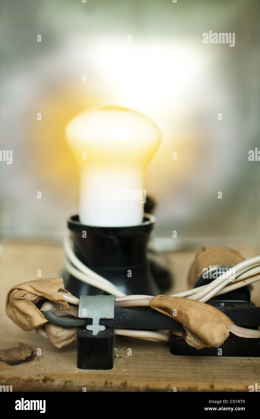 Old electrical components, cables and illuminated lamp Stock Photo - Alamy