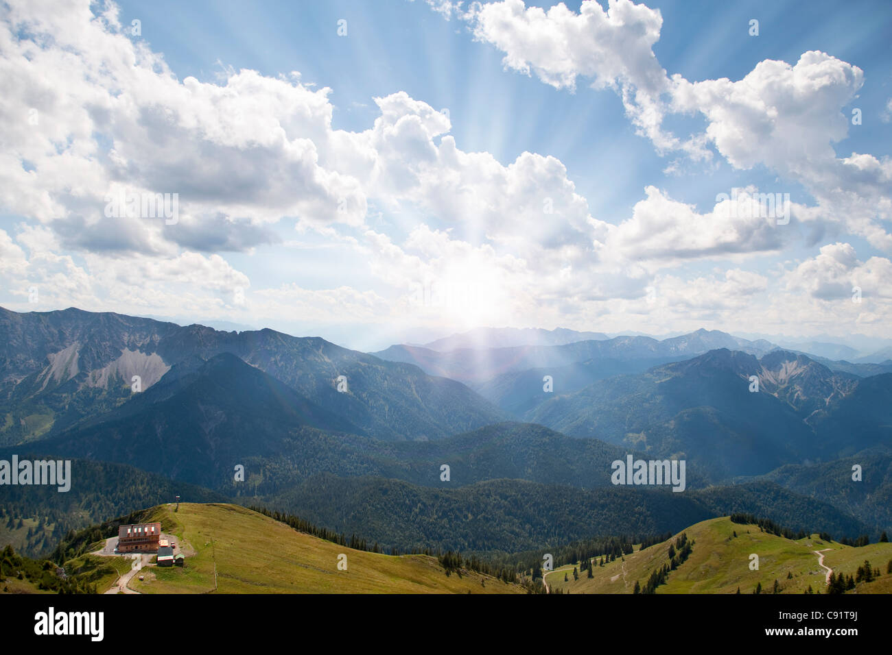 Sun rising over rural mountains Stock Photo - Alamy