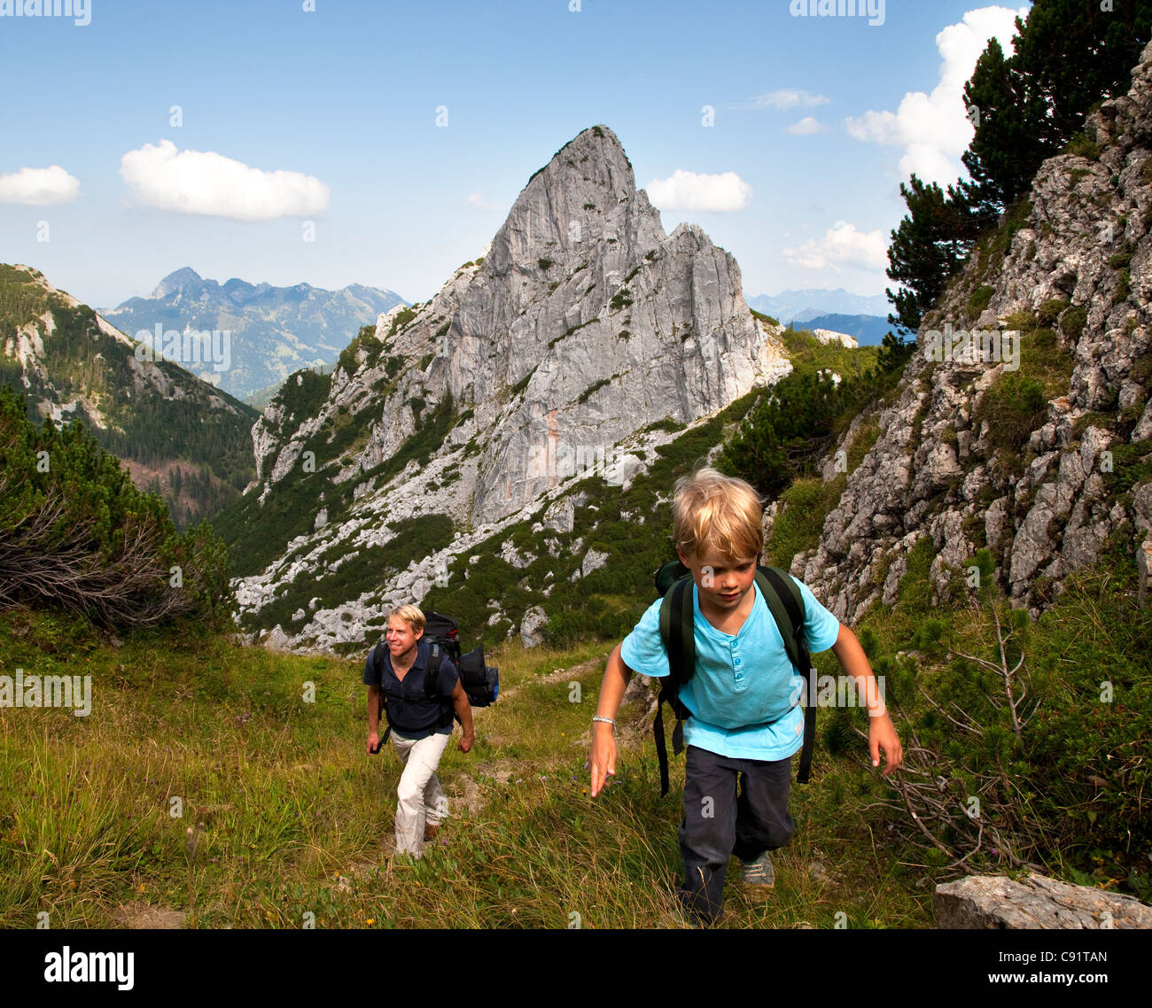 Son following father hi-res stock photography and images - Alamy
